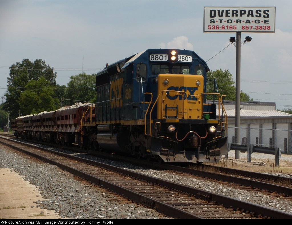 CSX 8801 leads a 5 car rock train west